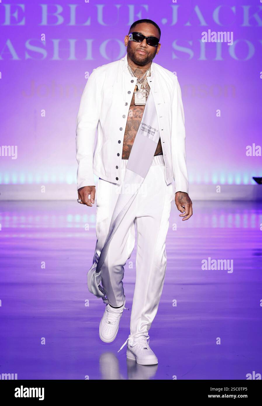 Jermaine Coleman walks the runway at the 9th annual Blue Jacket Fashion ...
