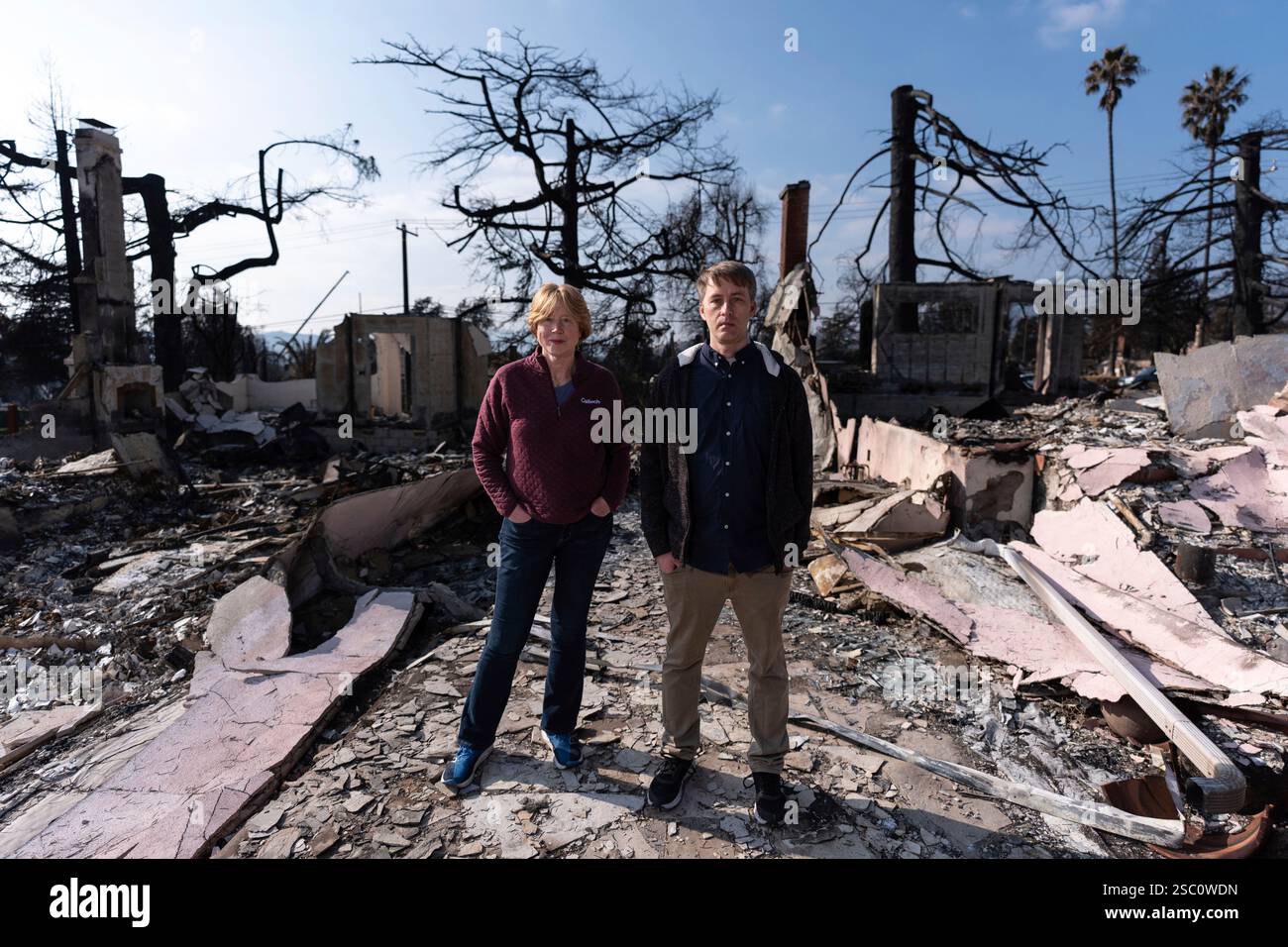Louise Hamlin, left, and Chris Wilson, two neighbors who lost their ...