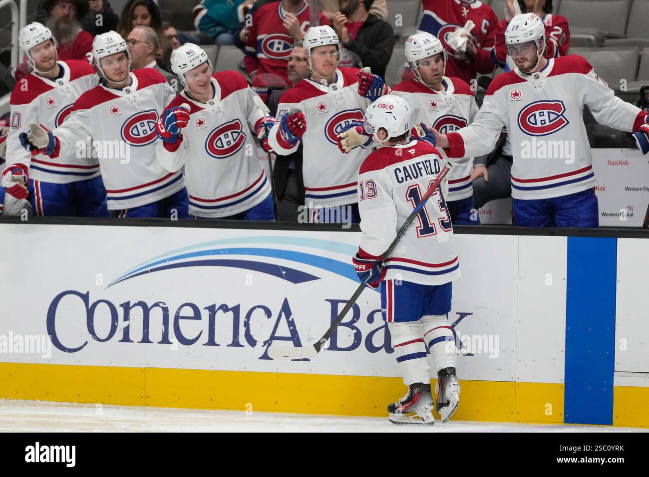 Montreal Canadiens right wing Cole Caufield (13) is congratulated by ...
