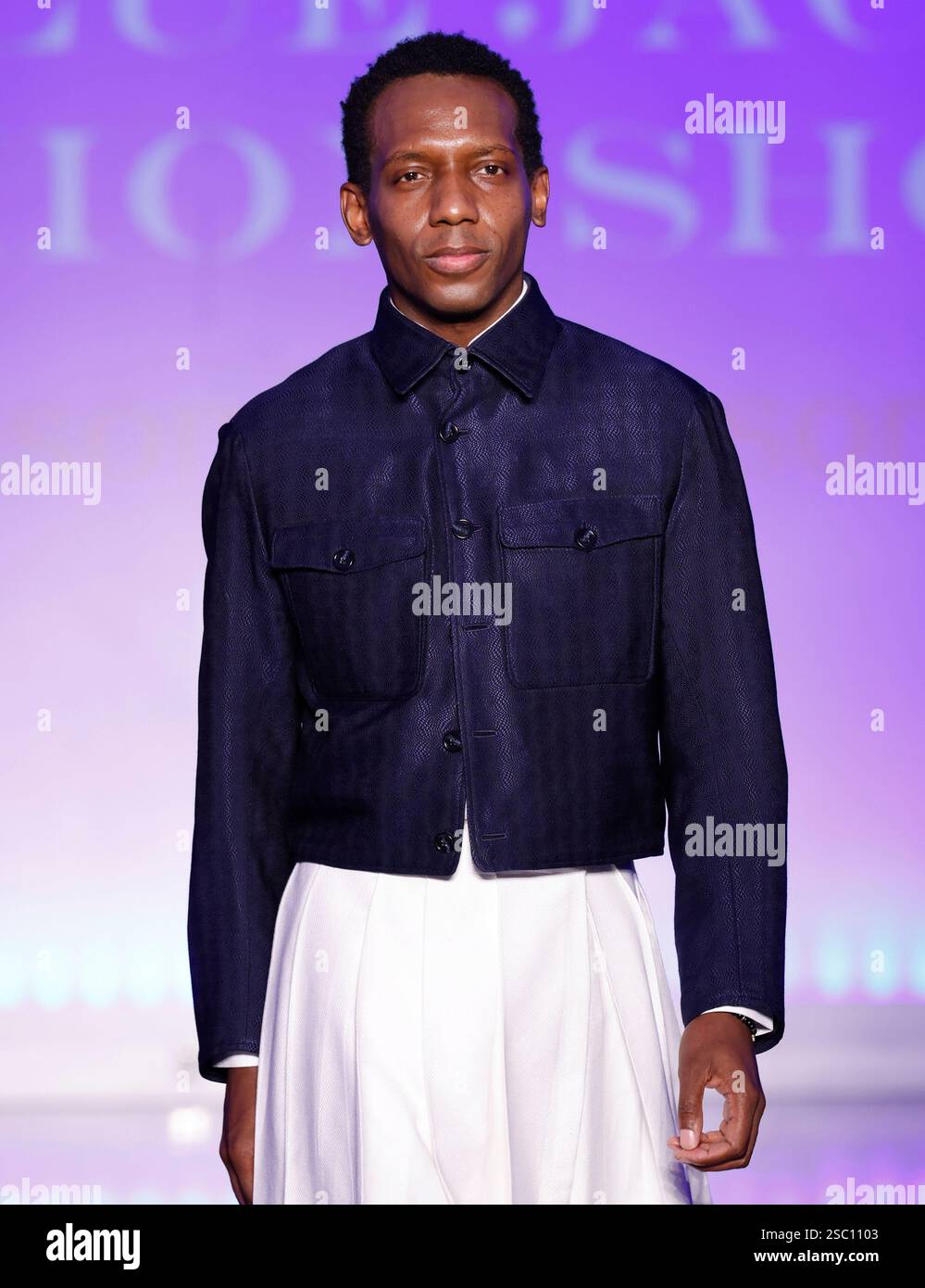 Carlos Greer walks the runway at the 9th annual Blue Jacket Fashion ...