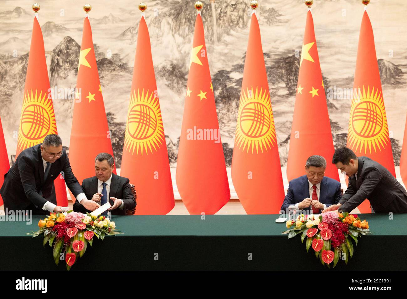 Chinese President Xi Jinping, right, and Kyrgyzstan's President Sadyr ...