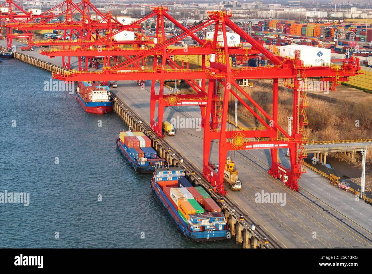 Cargo ships stop at their berths for orderly loading and unloading of ...