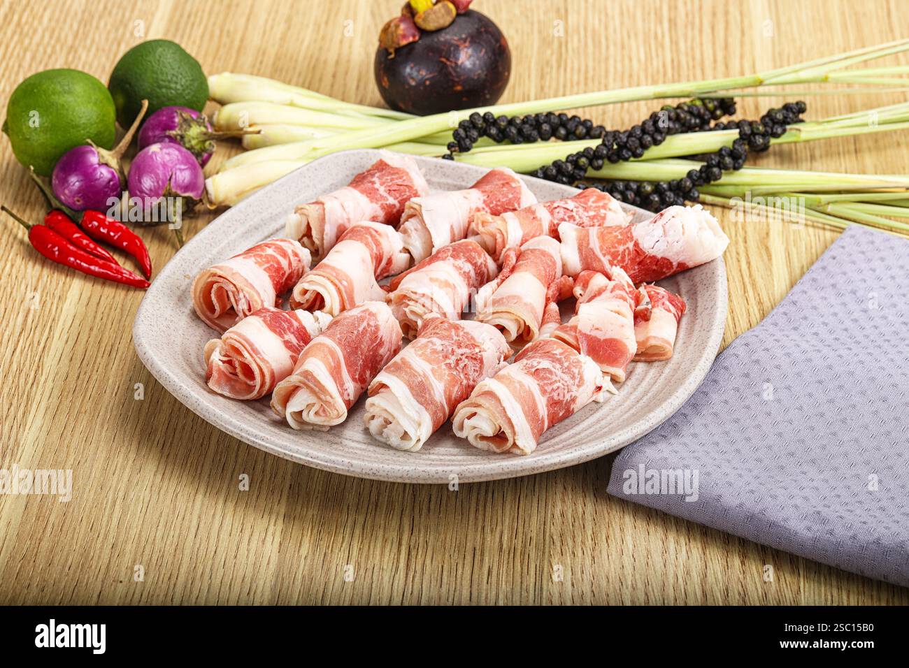 Raw beef bacon roll for grill Stock Photo - Alamy