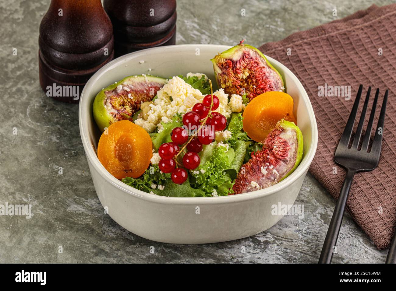 Salad with fig and sheep cottage cheese Stock Photo - Alamy