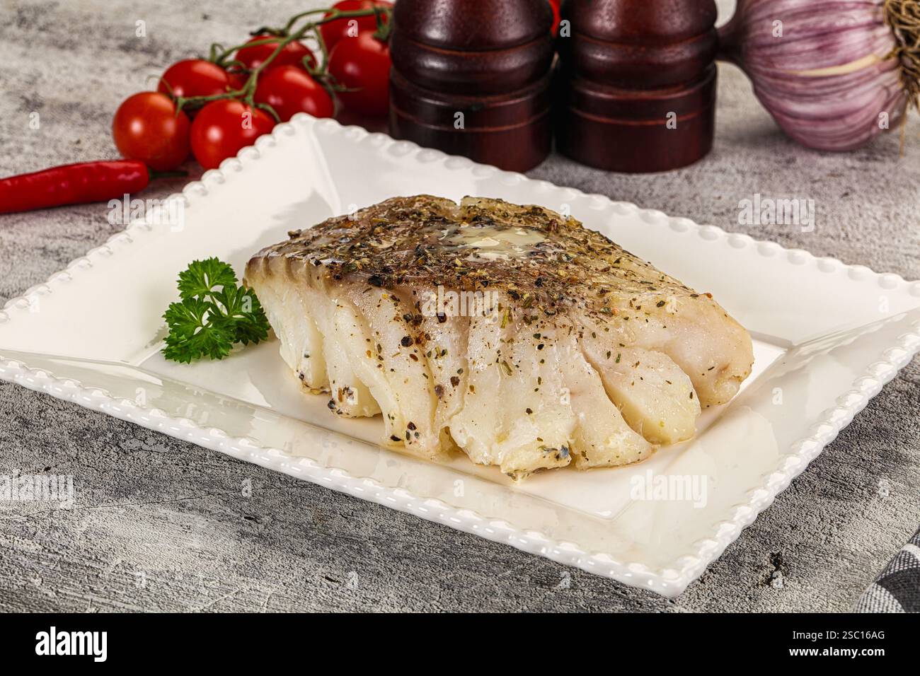 Dietary Baked cod fish fillet with spices Stock Photo - Alamy