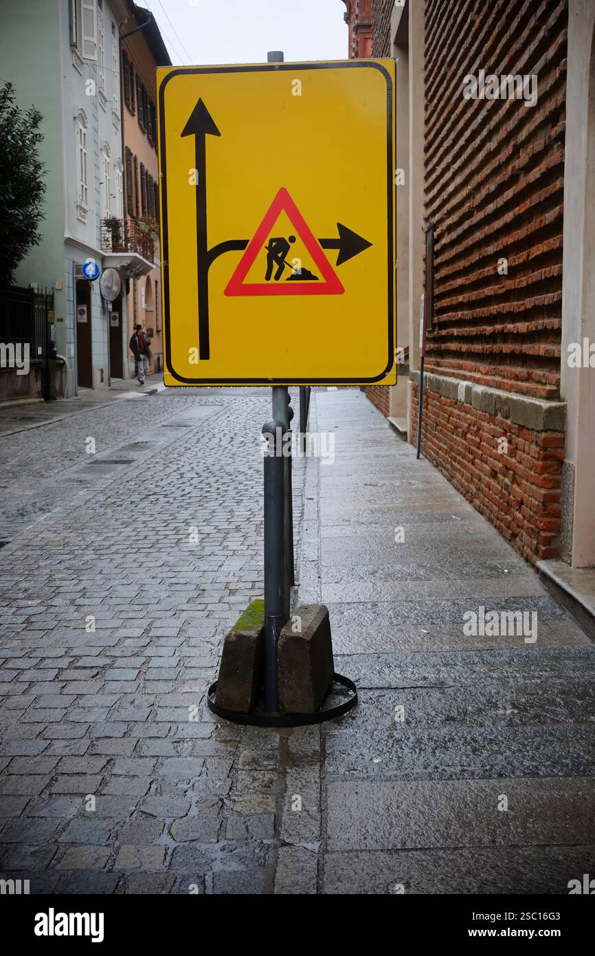 Cremona, Italy - January 30th 2025 A yellow road sign displays a detour ...
