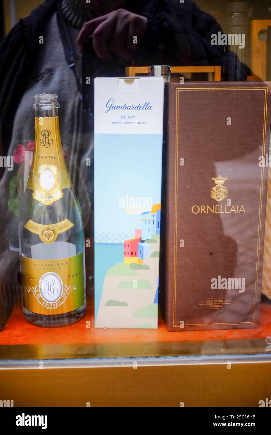 Cremona, Italy - January 30th 2025 A display case shows a bottle of ...