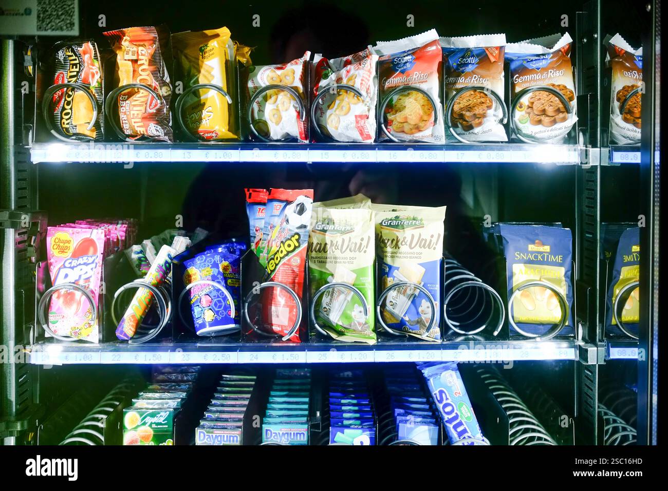 Cremona, Italy - January 30th 2025 The image shows a well-lit vending ...