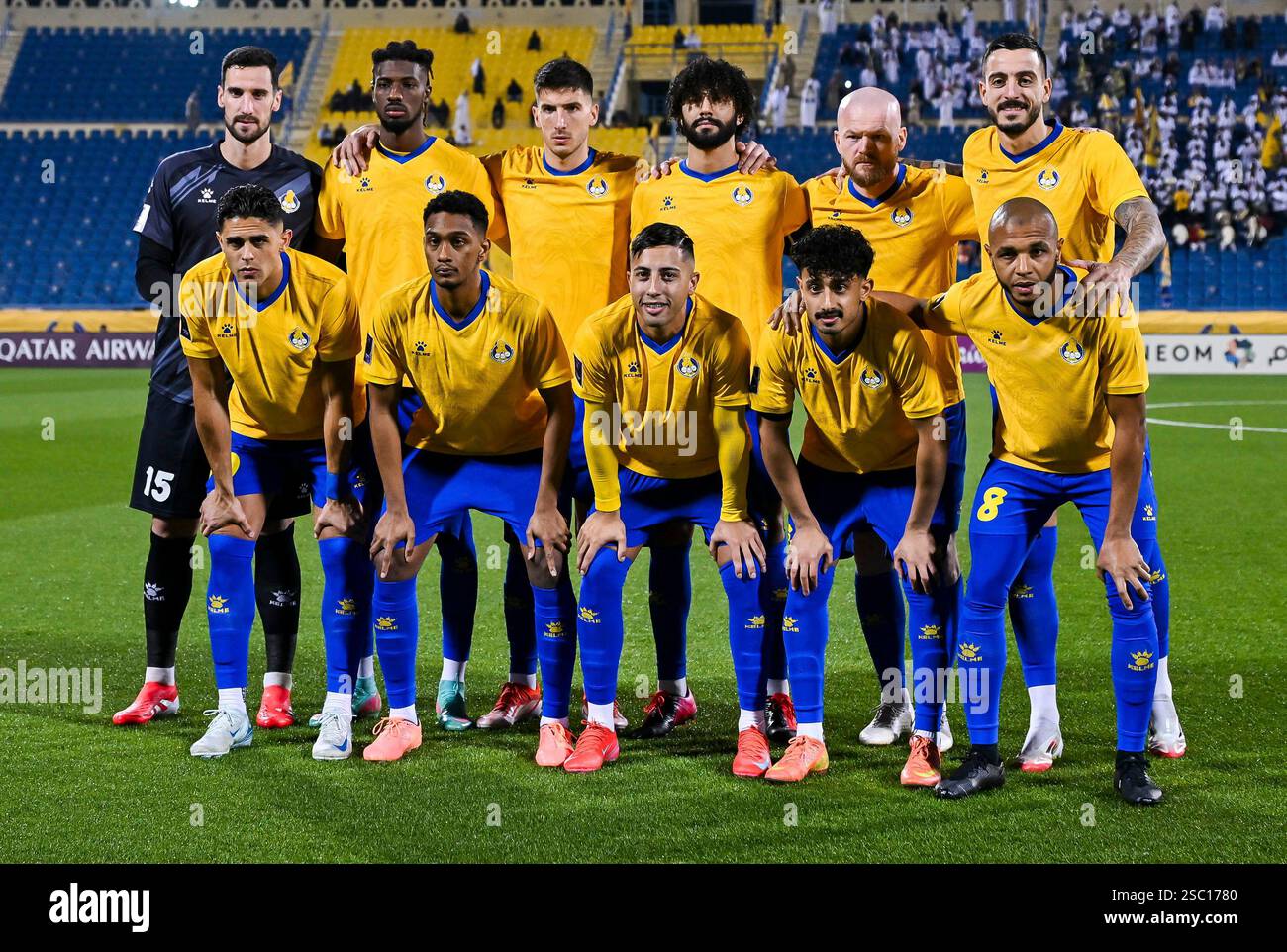 Doha, Qatar. 4th Feb, 2025. Starting players of Al Gharafa SC pose for ...