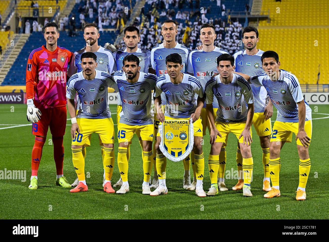 Doha, Qatar. 4th Feb, 2025. Starting players of Pakhtakor pose for a ...