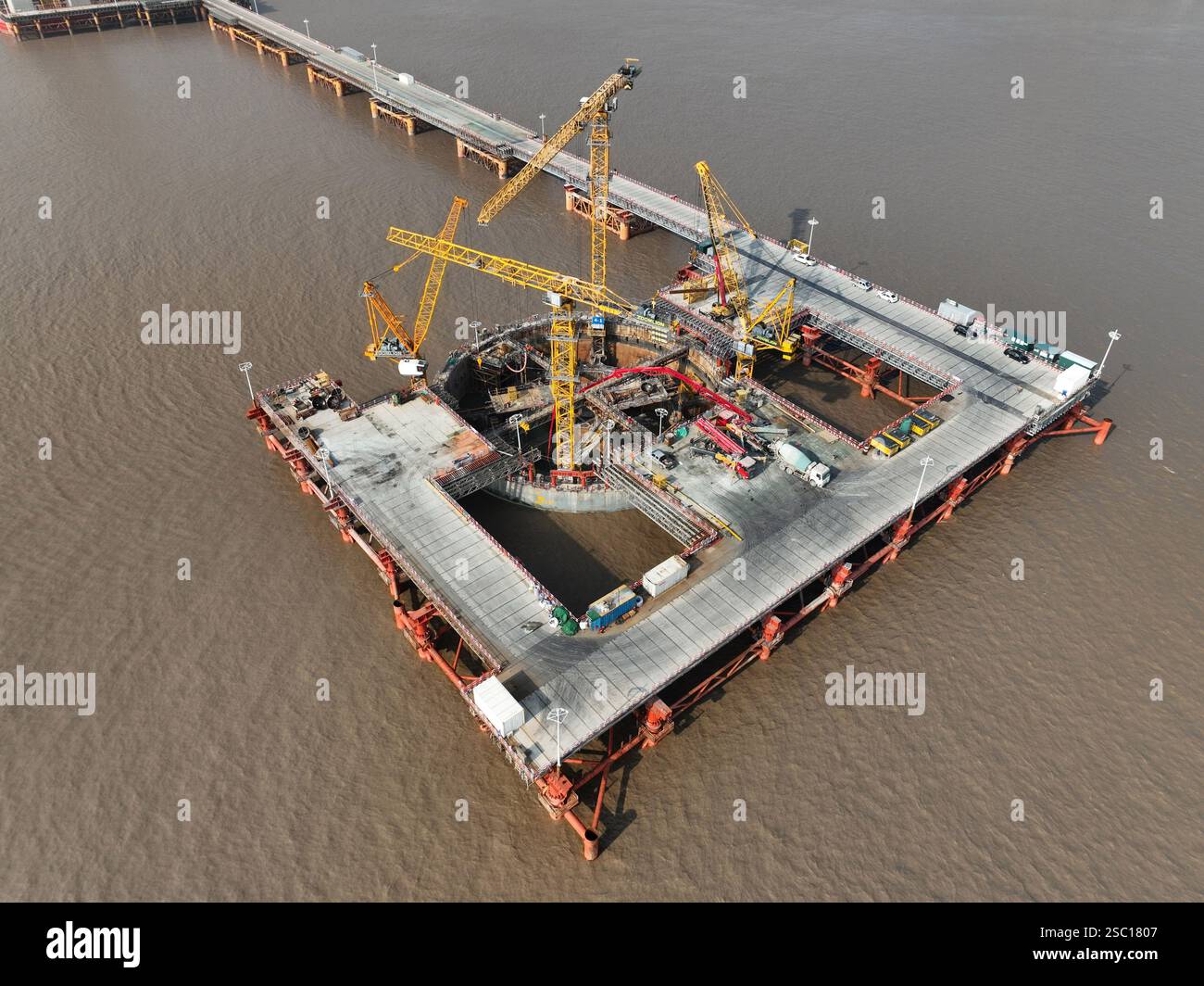 ZHOUSHAN, CHINA - FEBRUARY 5, 2025 - Workers work on the construction site of the No. 4 main ...