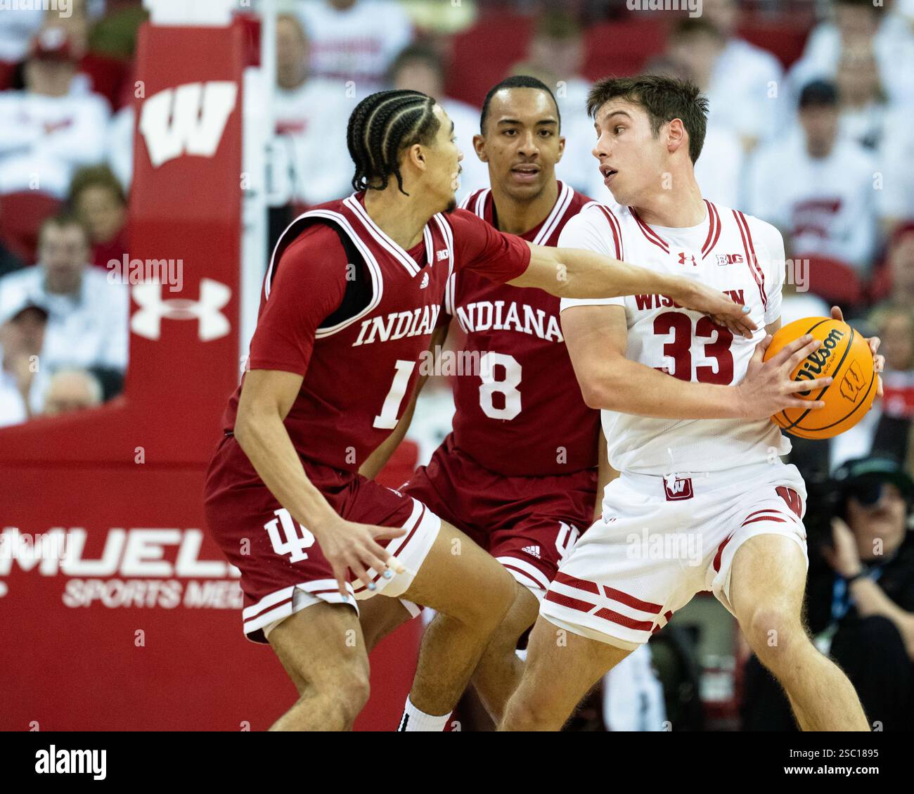 Madison, Wisconsin, USA. 4th Feb, 2025. Indiana's MYLES RICE (left) and ...