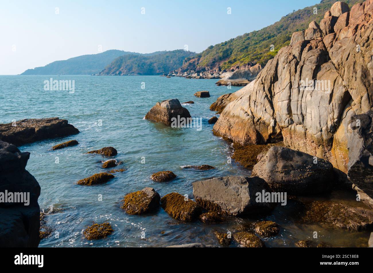 The rocks and mountains at Palolem beach in Goa, India Stock Photo - Alamy