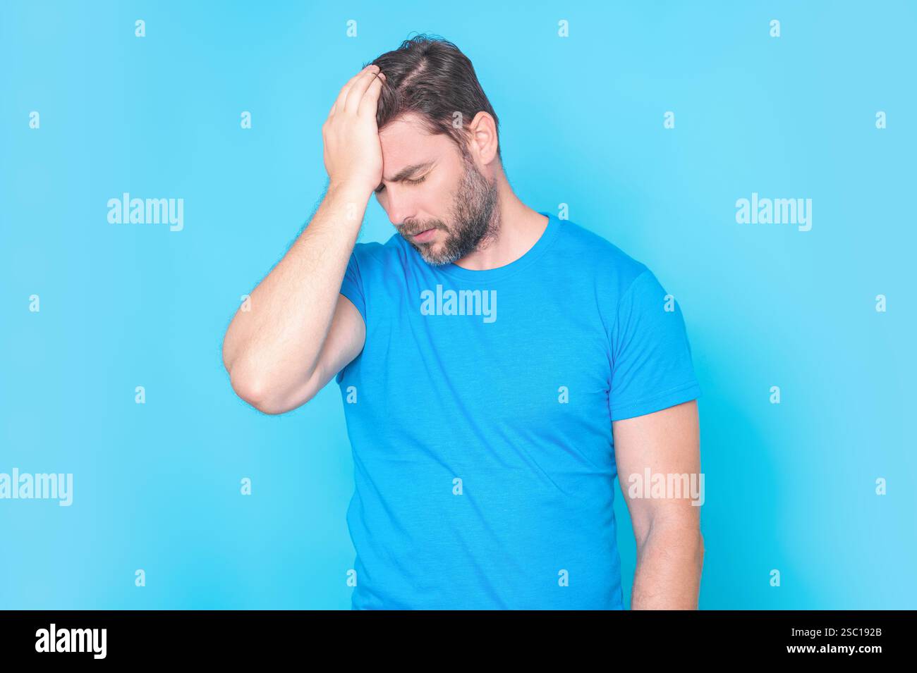 Man feeling migraine head strain. Tired bored man has headache ...