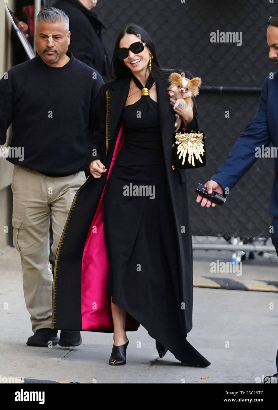 Photo by: zz/GOTPAP/STAR MAX/IPx 2025 2/4/25 Demi Moore - holding her ...
