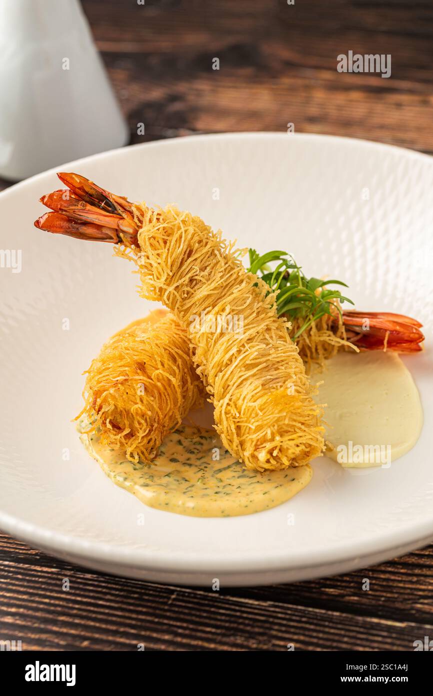 Deep fried tiger prawns wrapped in kataifi. jumbo shrimp wrapped in ...