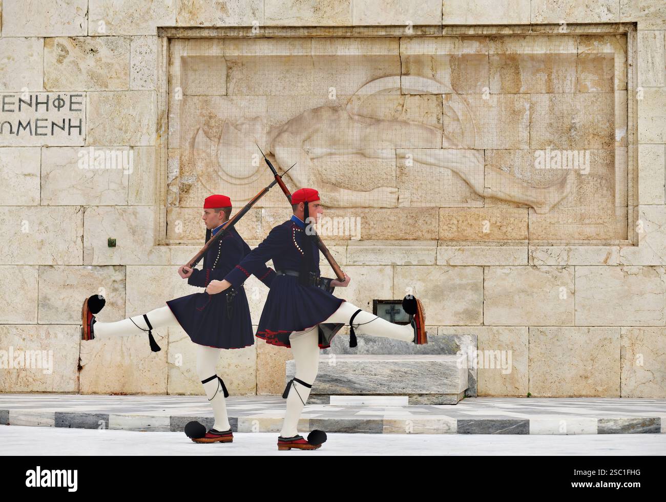 Evzones (palace ceremonial guards) changing guard in front of the Tomb of the Unknown Soldier ...