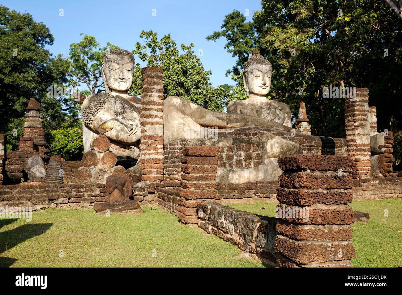 Sitting and reclining Buddha statues in the ruins of Wat Phra Kaew (or ...