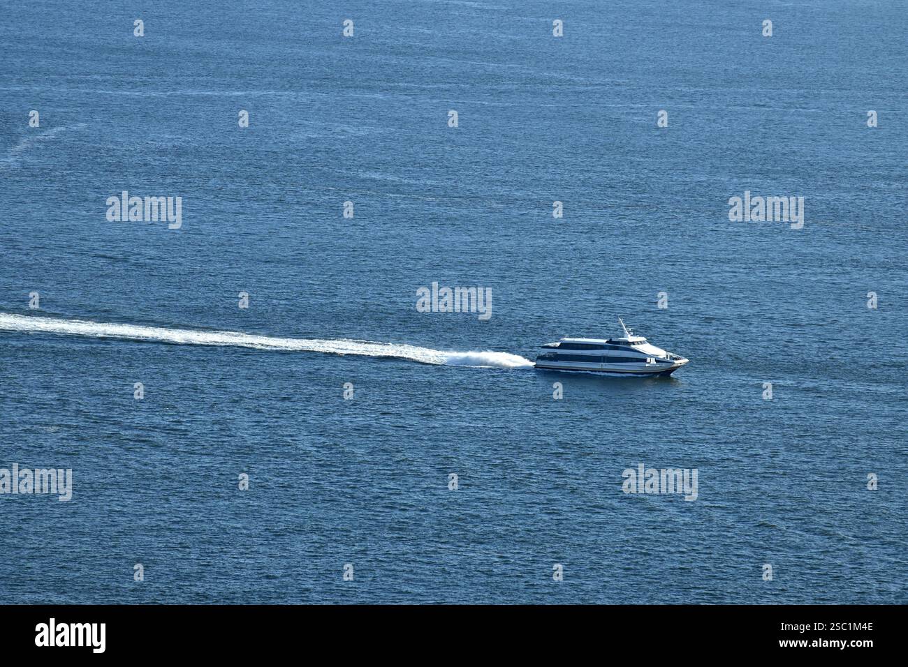 The ship is moving fast on the sea Stock Photo - Alamy