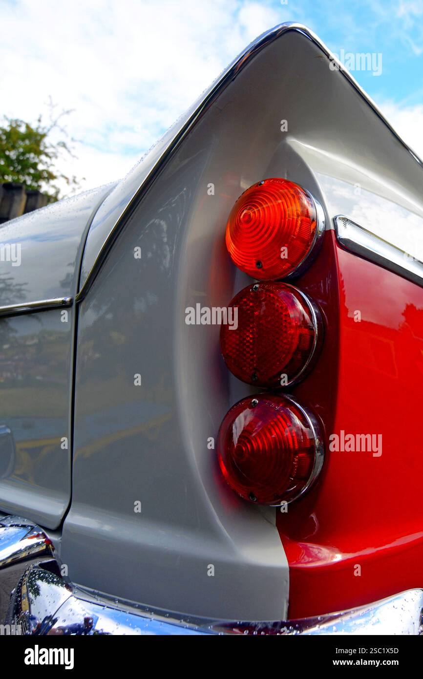 Rear light cluster and swept rear tail fin on a vintage Singer car ...