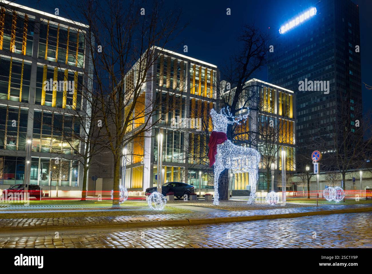 Modern urban scene in Riga, Latvia at night. Illuminated buildings and ...