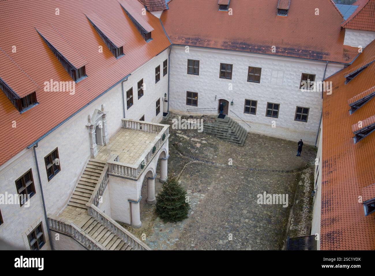 Bauska Castle in Latvia, with its medieval towers and red tiled roof ...