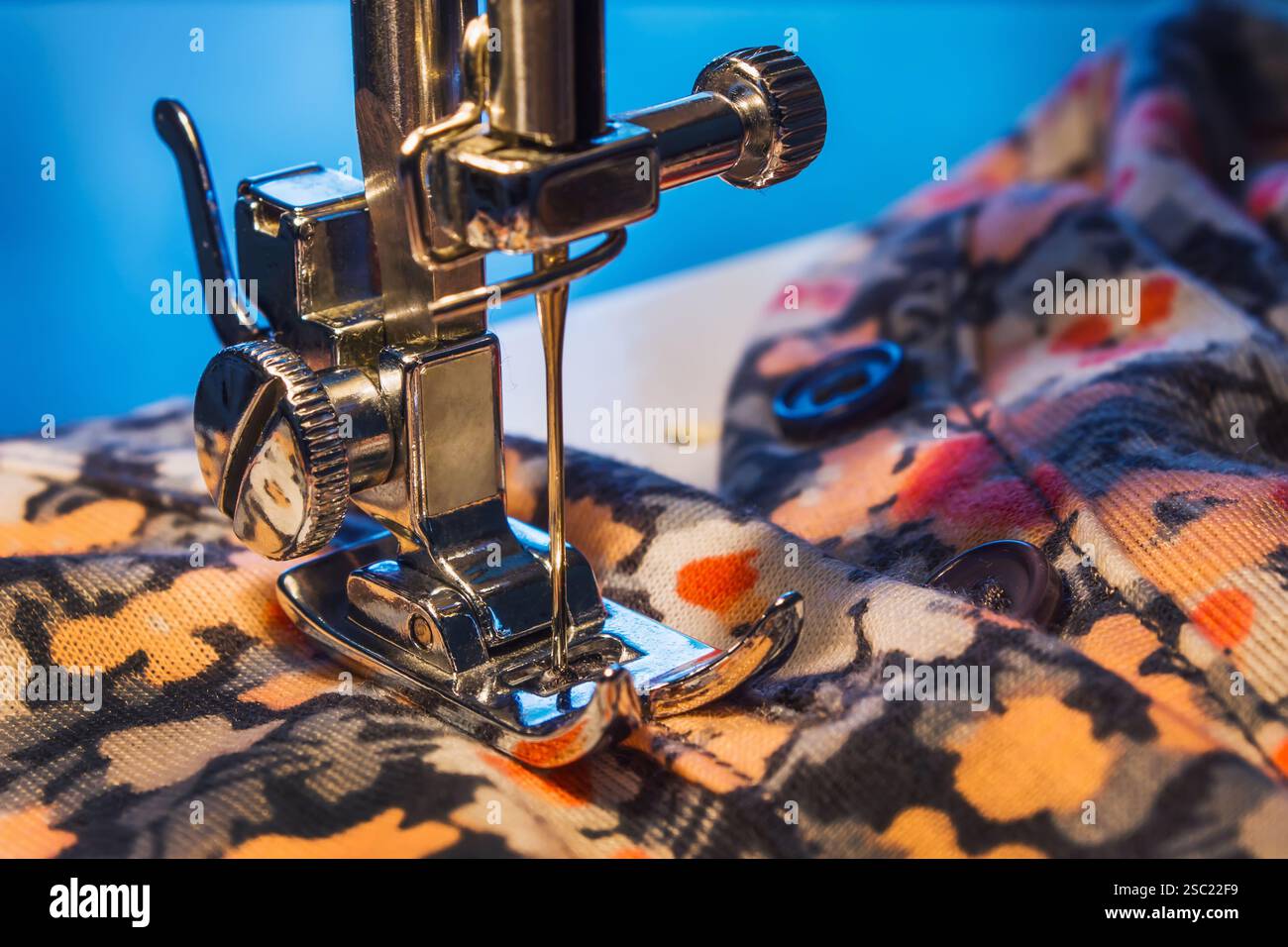 sewing machine and item of clothing Stock Photo - Alamy