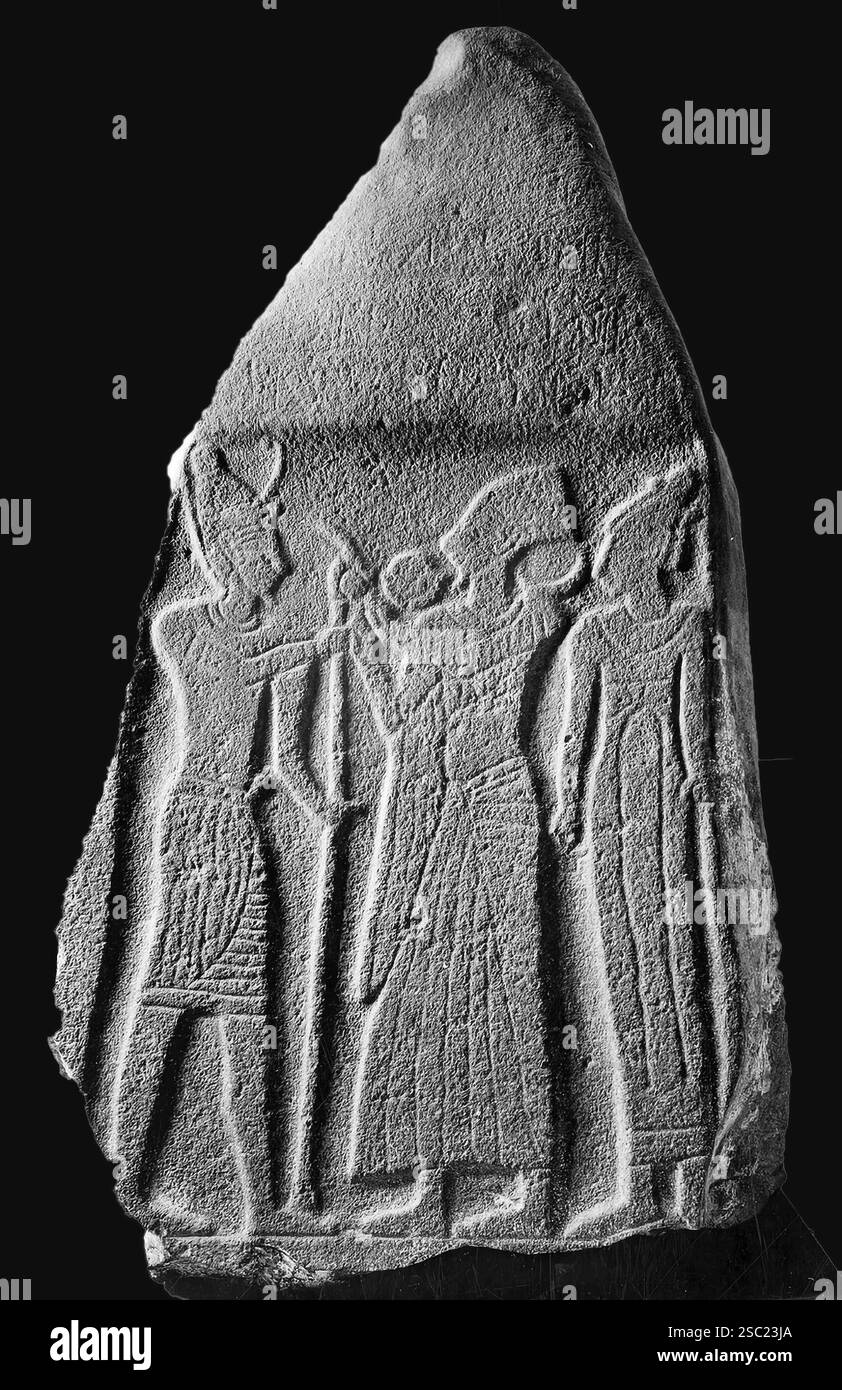 7490. The Balu'a Stele is a basalt inscribed stone with a near ...