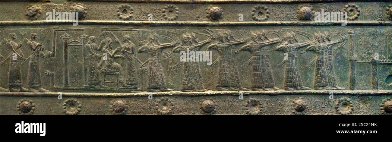7623. Bronze relief from the Balawat Gates: Shalmaneser watching the ...