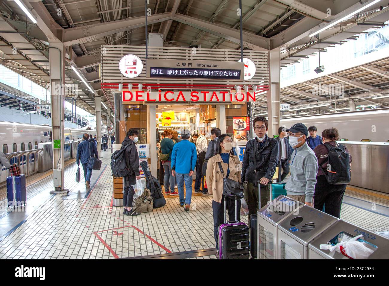 Tokyo's Ueno station platform with Delica Station, many people and ...
