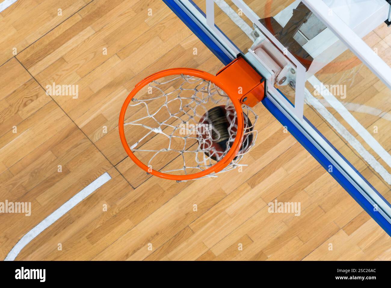 Top view of a ball hitting a basketball hoop Stock Photo - Alamy