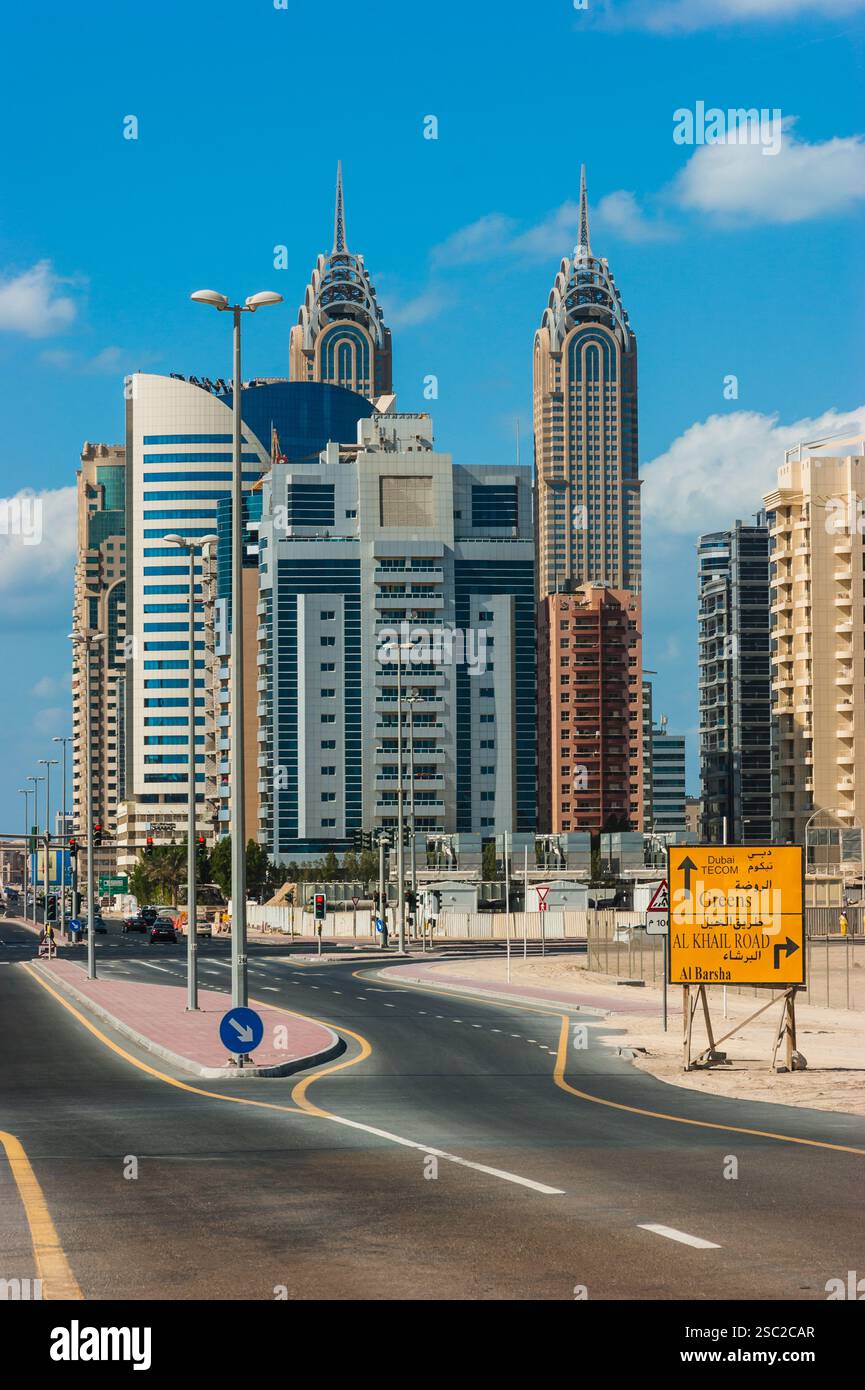 DUBAI, UAE - NOVEMBER 17: High rise buildings and streets nov 17. 2012 ...