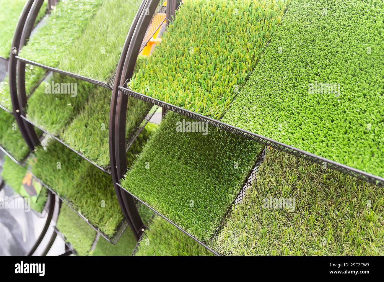 Samples of artificial lawn on the showcase. Industry Stock Photo - Alamy