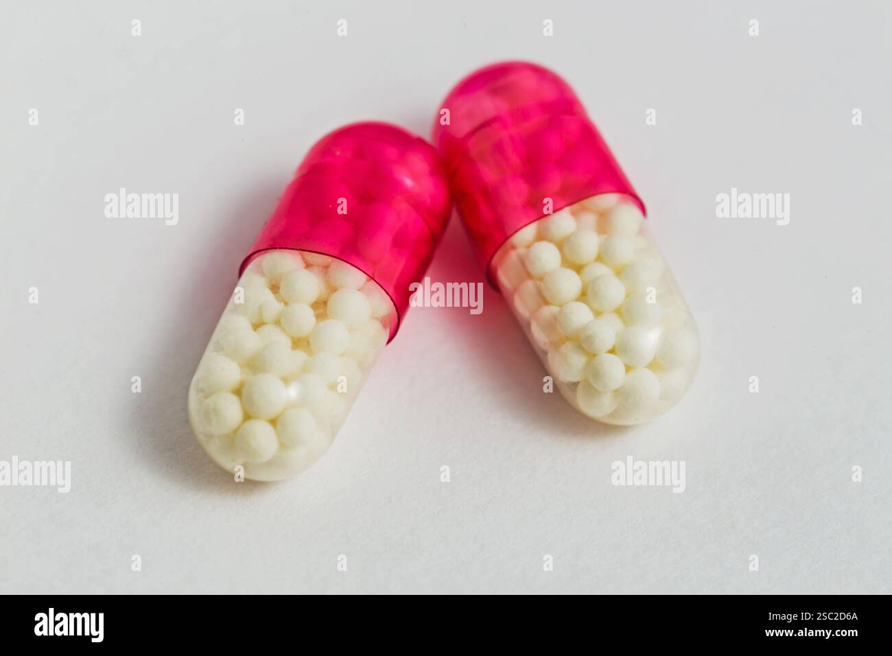 the color pill or just salmon oil capsules Stock Photo - Alamy