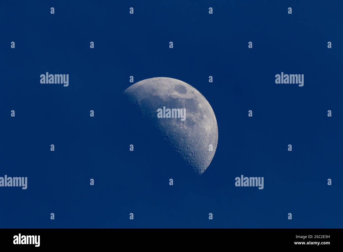 A view of the half-lit moon. (FeatureChina via AP Images Stock Photo ...