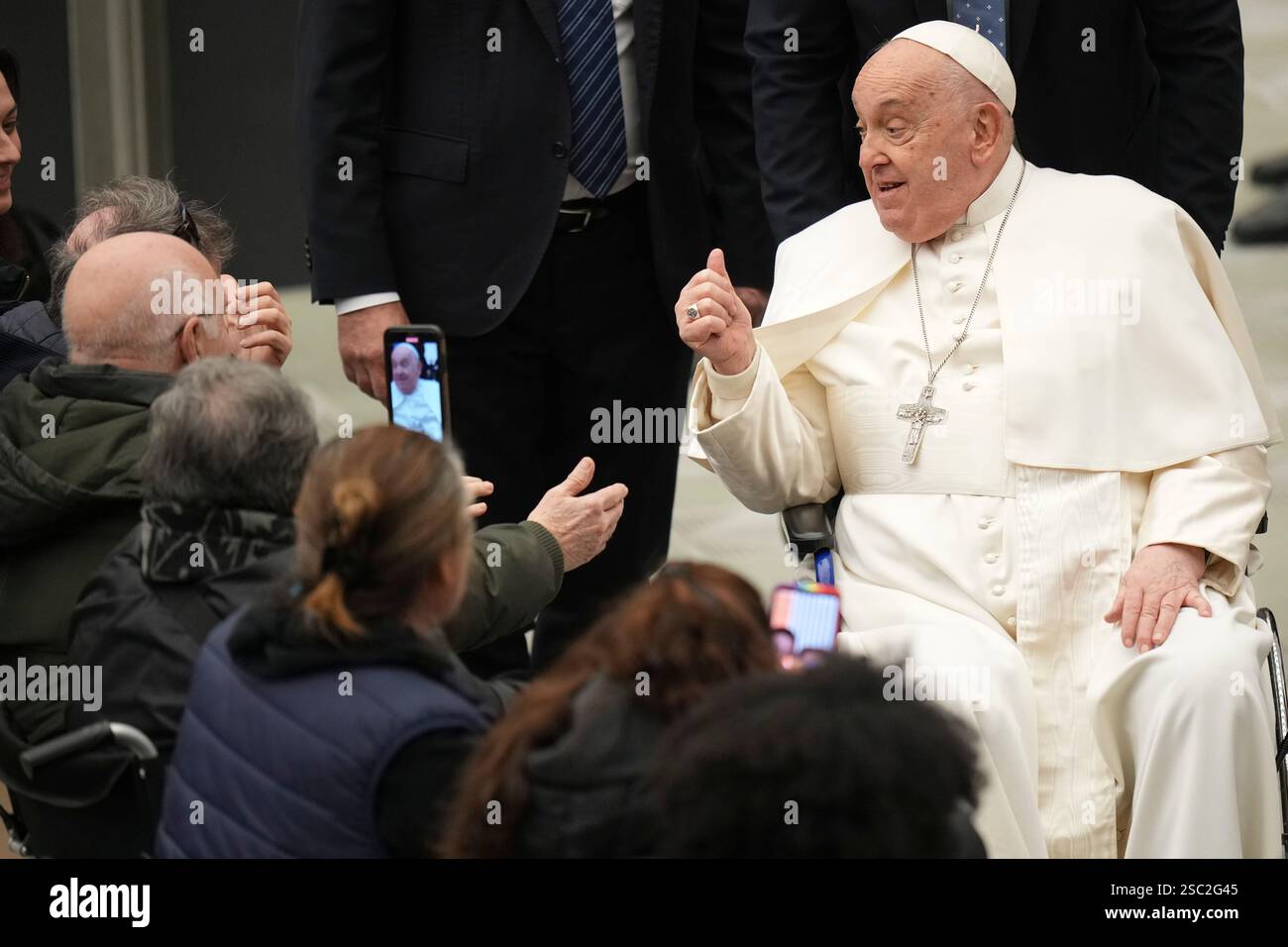 Pope Francis greets the faithful during his weekly general audience in ...