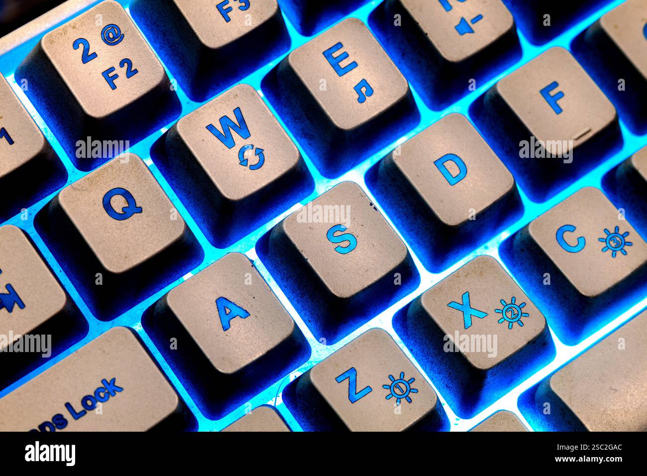 Dark blue rgb keyboard. WASD keyboard button Stock Photo - Alamy