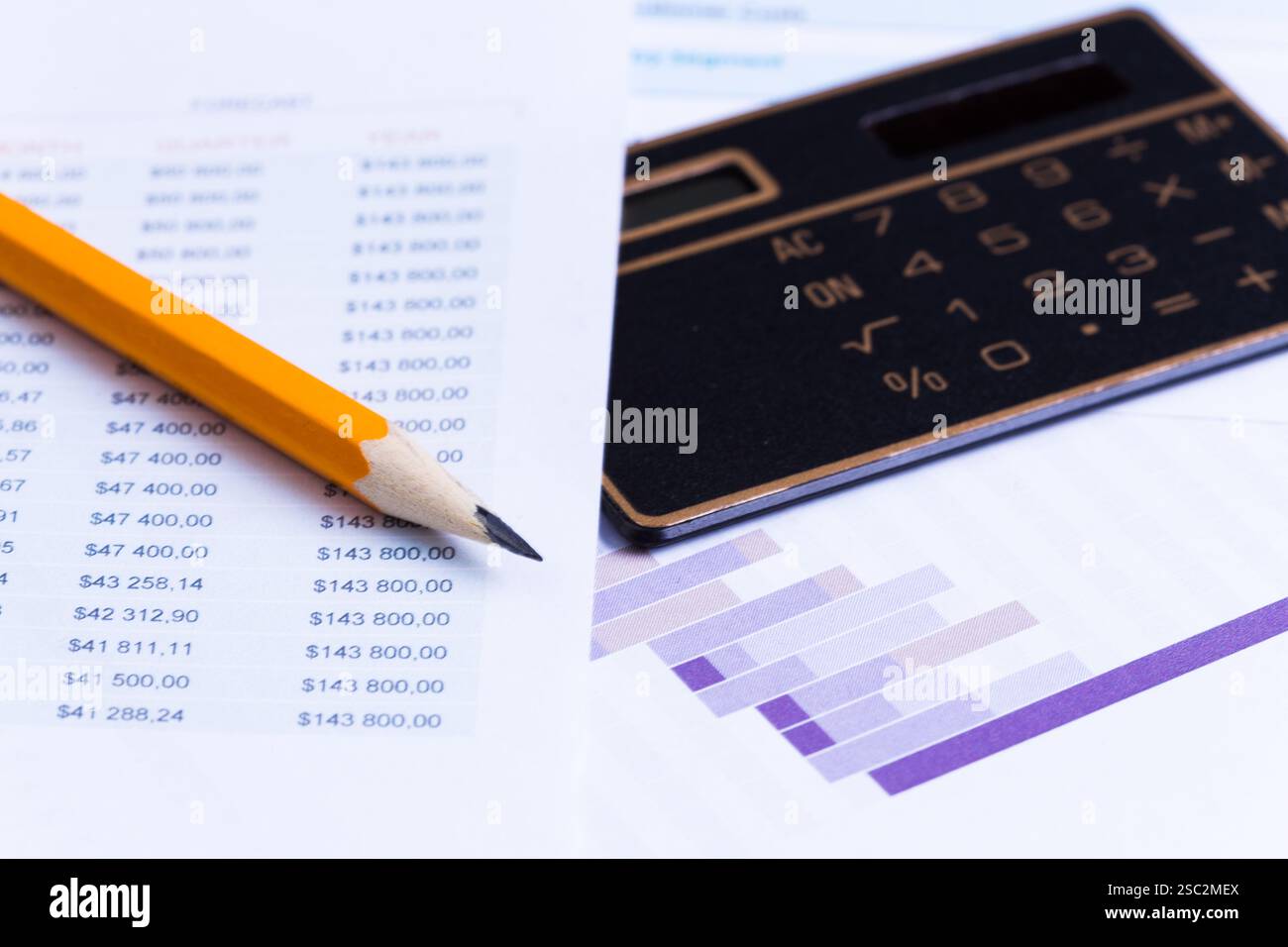 Graphs and Calculator Stock Photo - Alamy