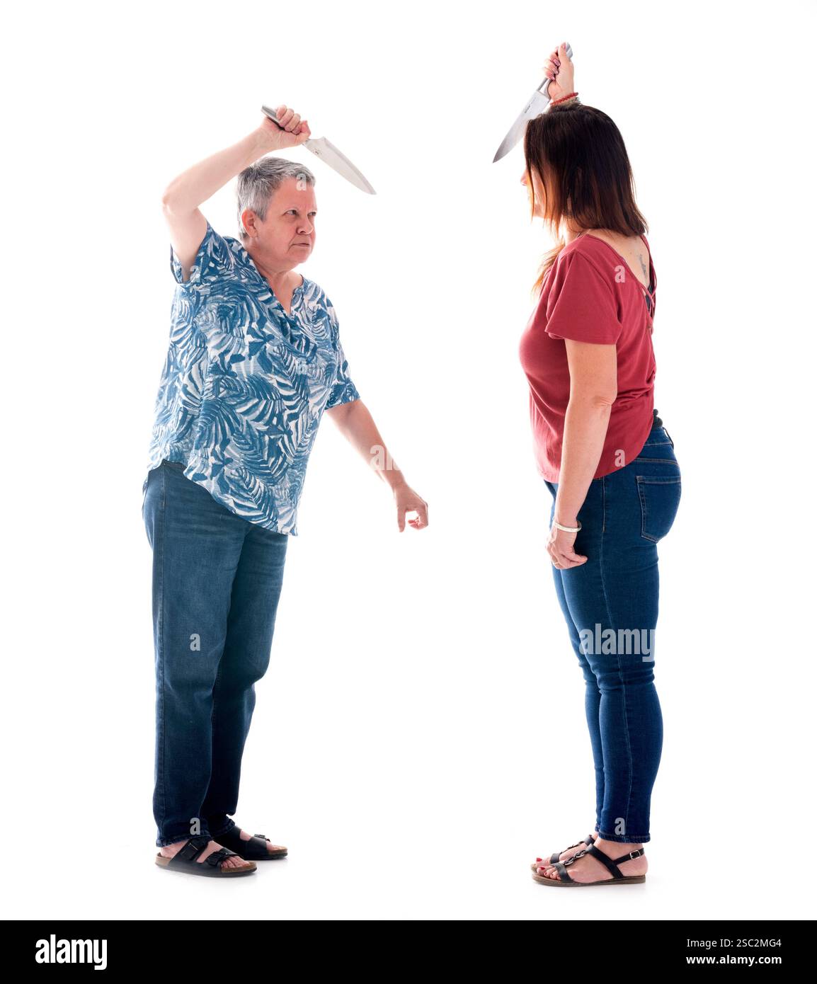 two friends disloyalty in front of white background Stock Photo - Alamy