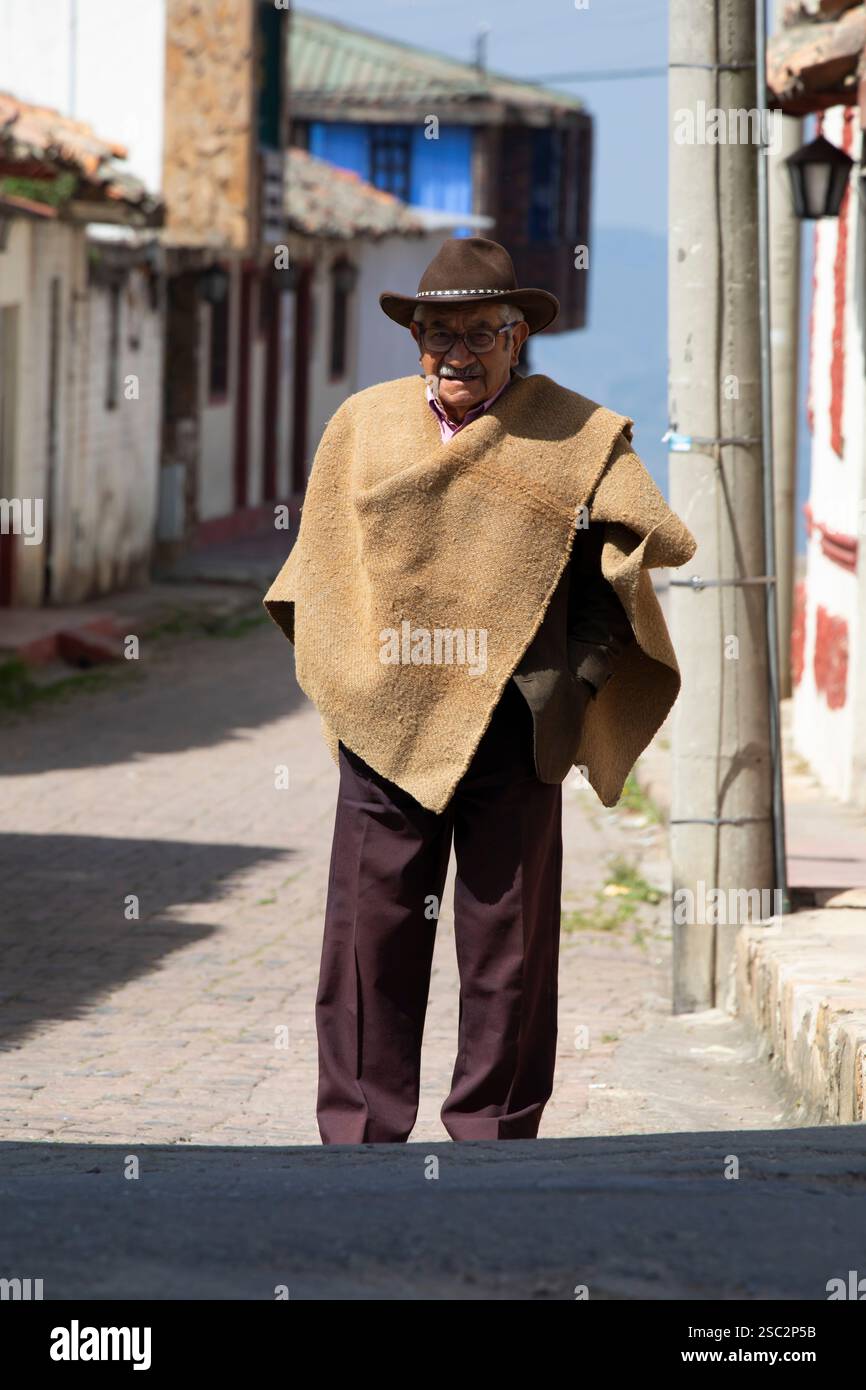Main square Topaga town. Senior man dressed colombian traditional cloth ...