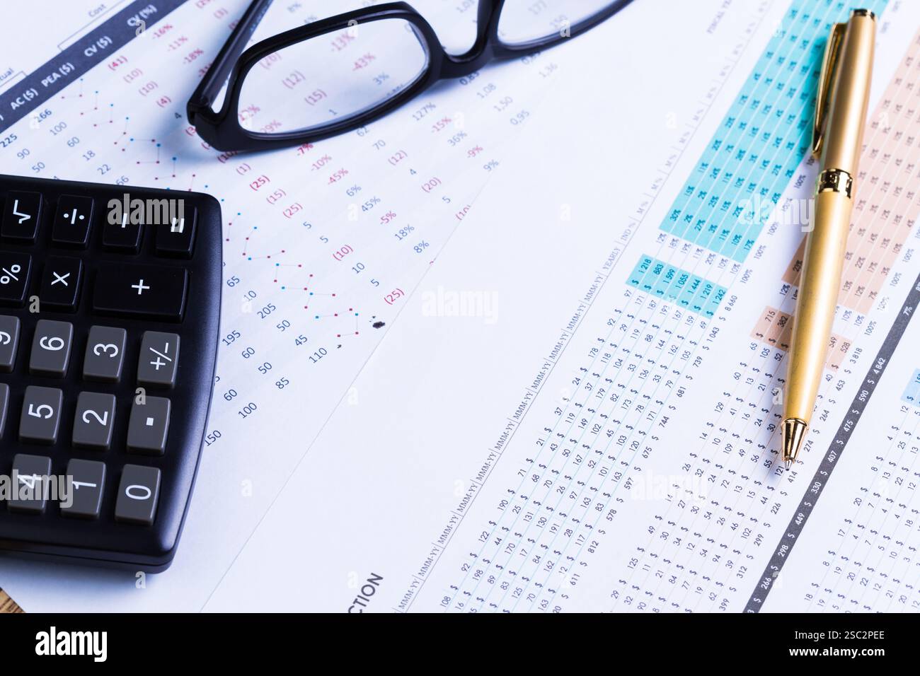 Graphs and Calculator Stock Photo - Alamy
