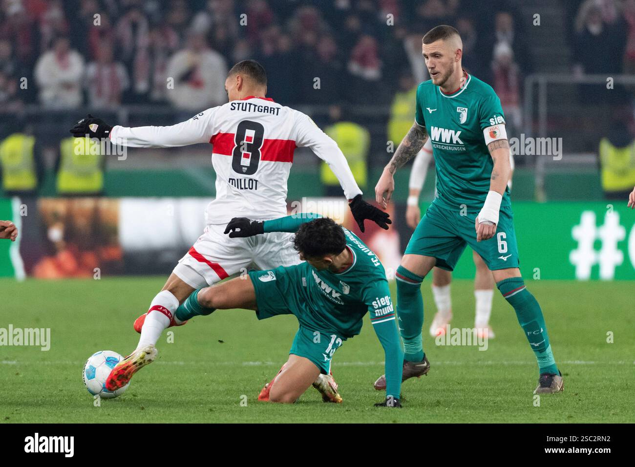 Stuttgart, Deutschland. 04th Feb, 2025. v. li. im Zweikampf Dimitris Giannoulis (FC Augsburg ...