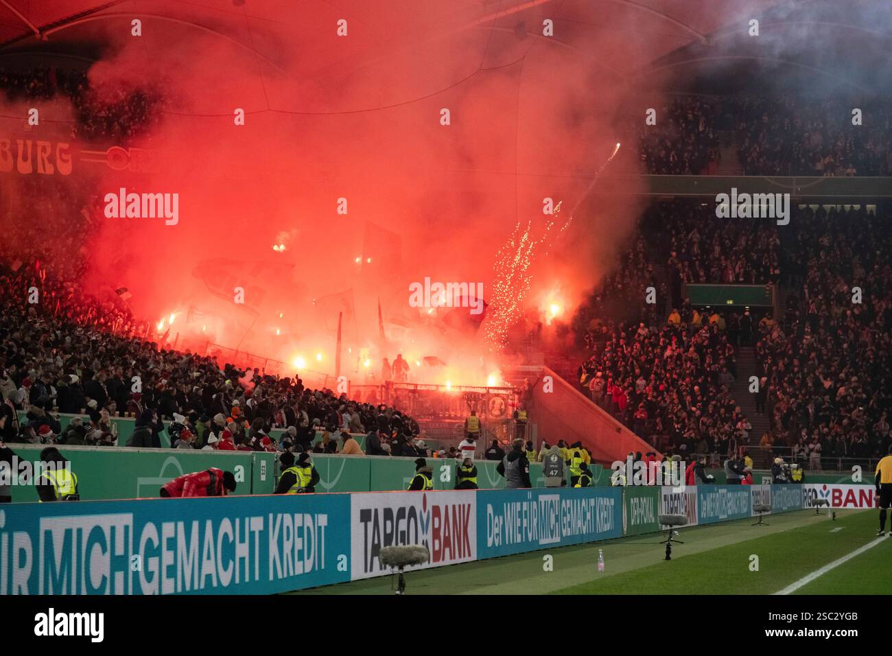 Stuttgart, Deutschland. 04th Feb, 2025. FC Augsburg Fans, Pyrotechnik ...