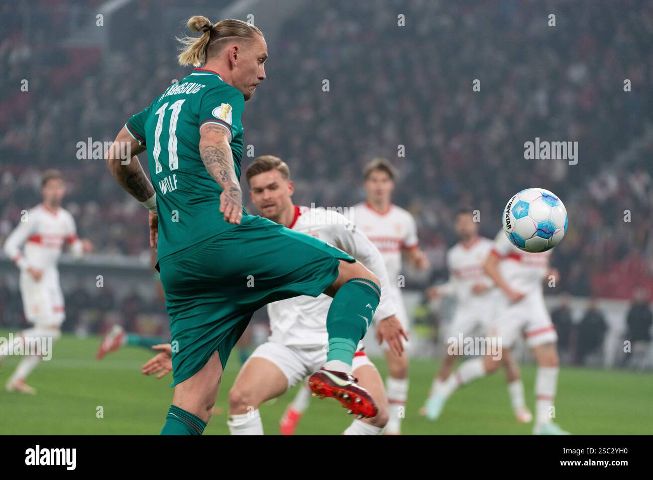 Stuttgart, Deutschland. 04th Feb, 2025. Marius Wolf (FC Augsburg, #11 ...