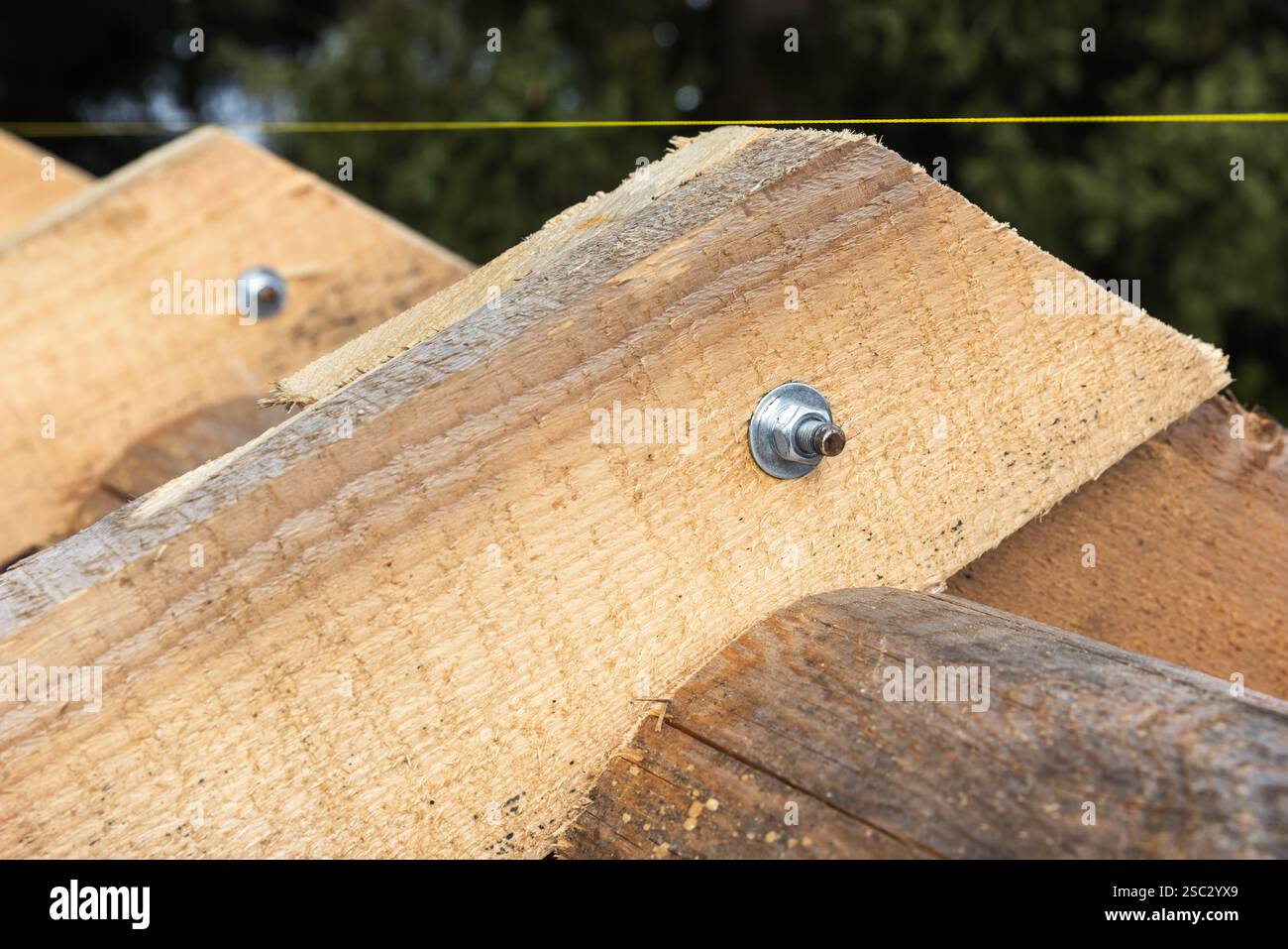 Rafters connected with bolts close-up photography. Background photo ...
