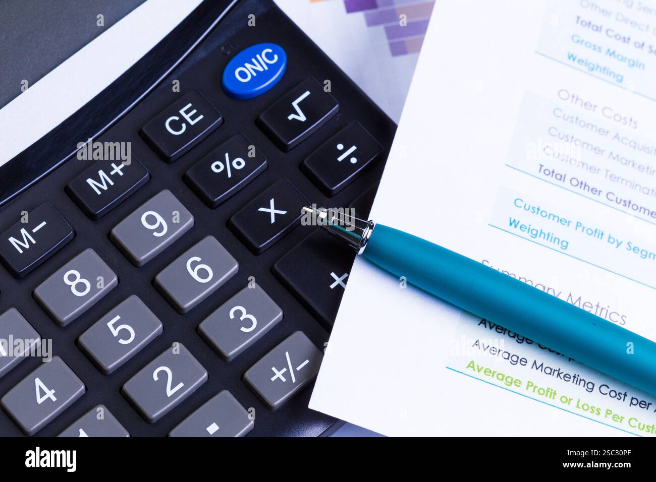 Graphs and Calculator Stock Photo - Alamy