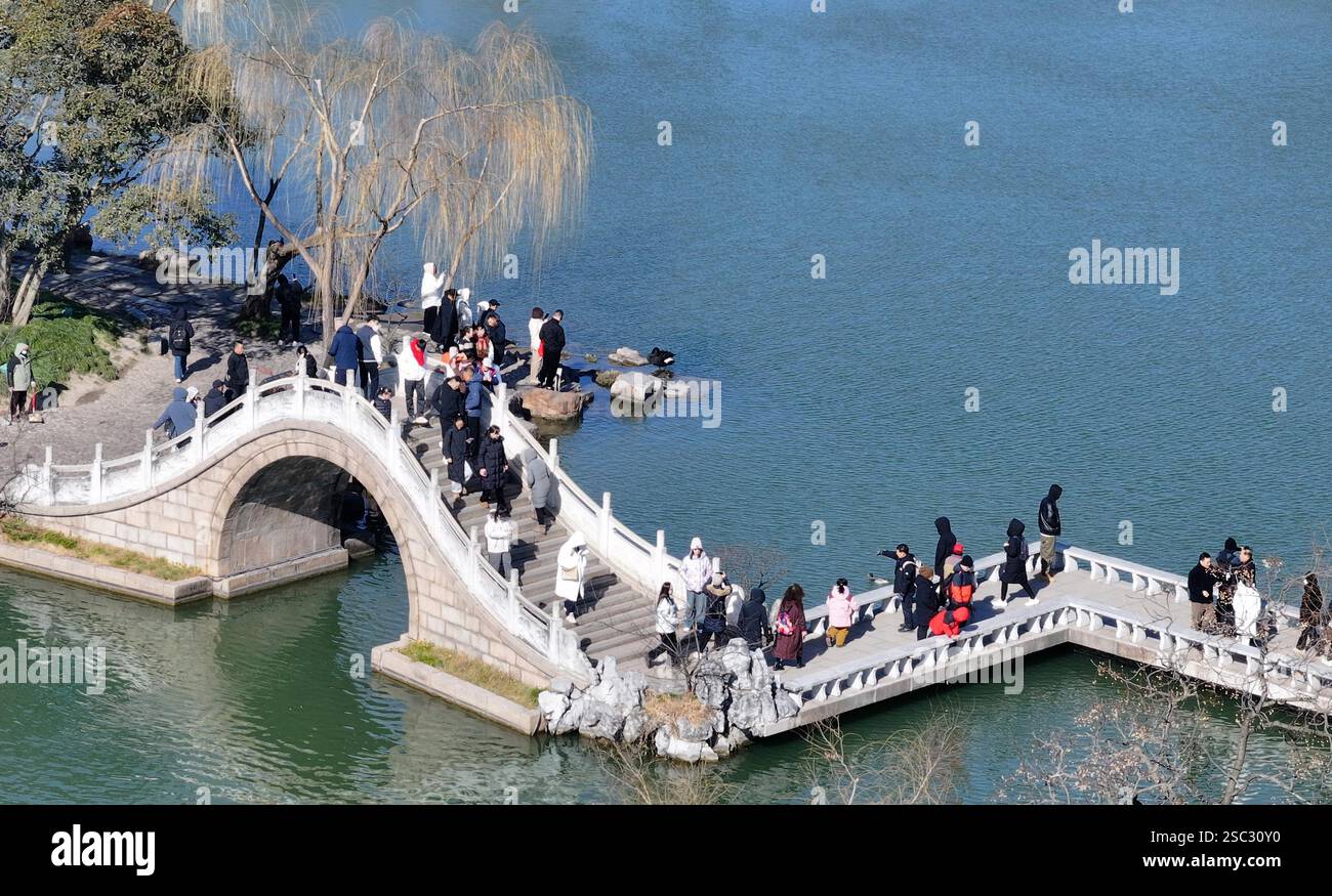 Aerial photo shows tourists visiting the Slender West Lake scenic area ...