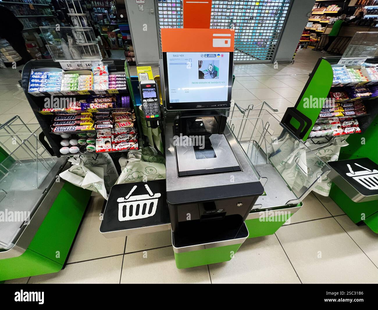 Kyiv, Ukraine - February 04, 2025: A self service checkout machine displayed prominently at an ...