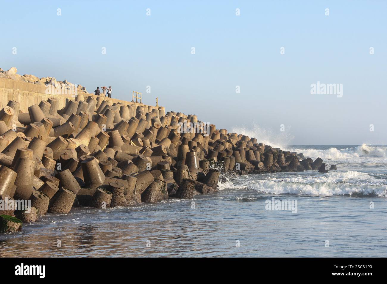 A coastal tetrapod construction system stands resilient against ...