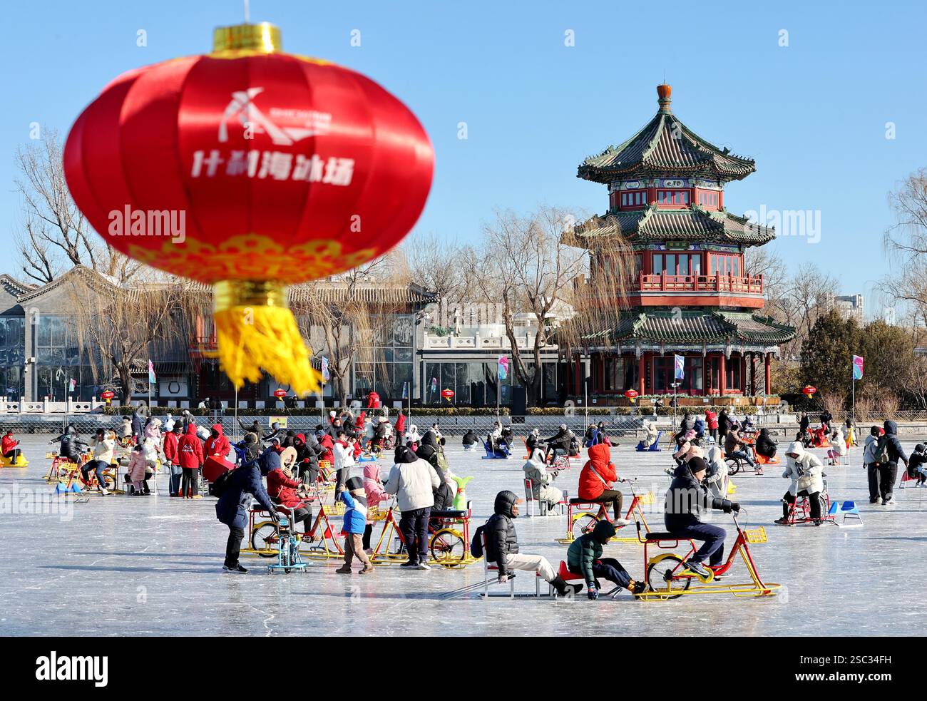 Visitors skate at an outdoor rink at Shichahai in Beijing, China, 28 ...